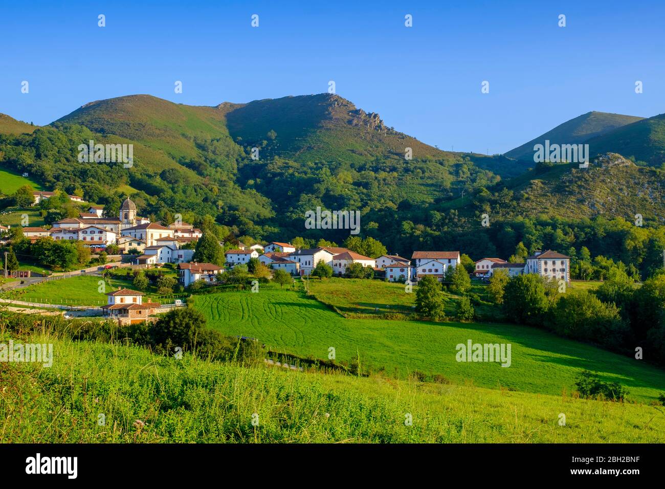 Village foot green forested hills hi-res stock photography and images ...