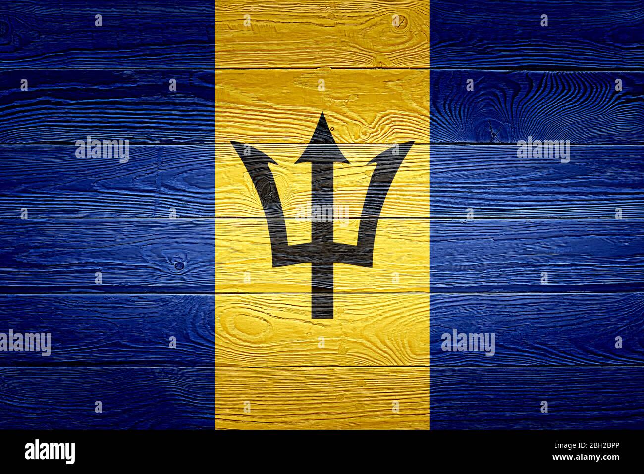 Barbados flag painted on old wood plank background. Brushed natural ...