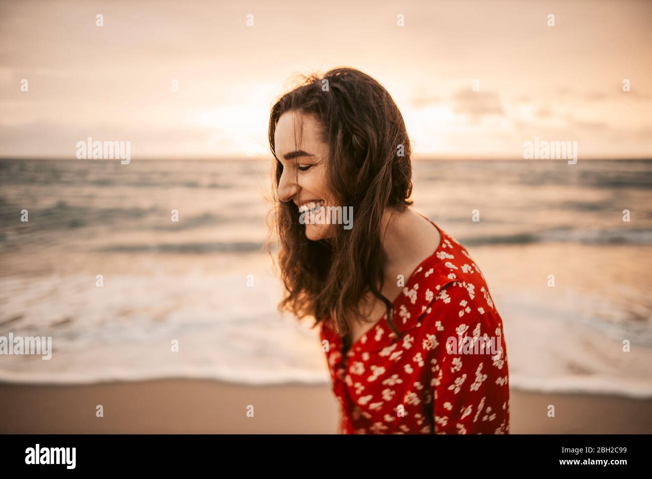 Happy woman at the seafront at sunrise, Miami, Florida, USA Stock Photo ...