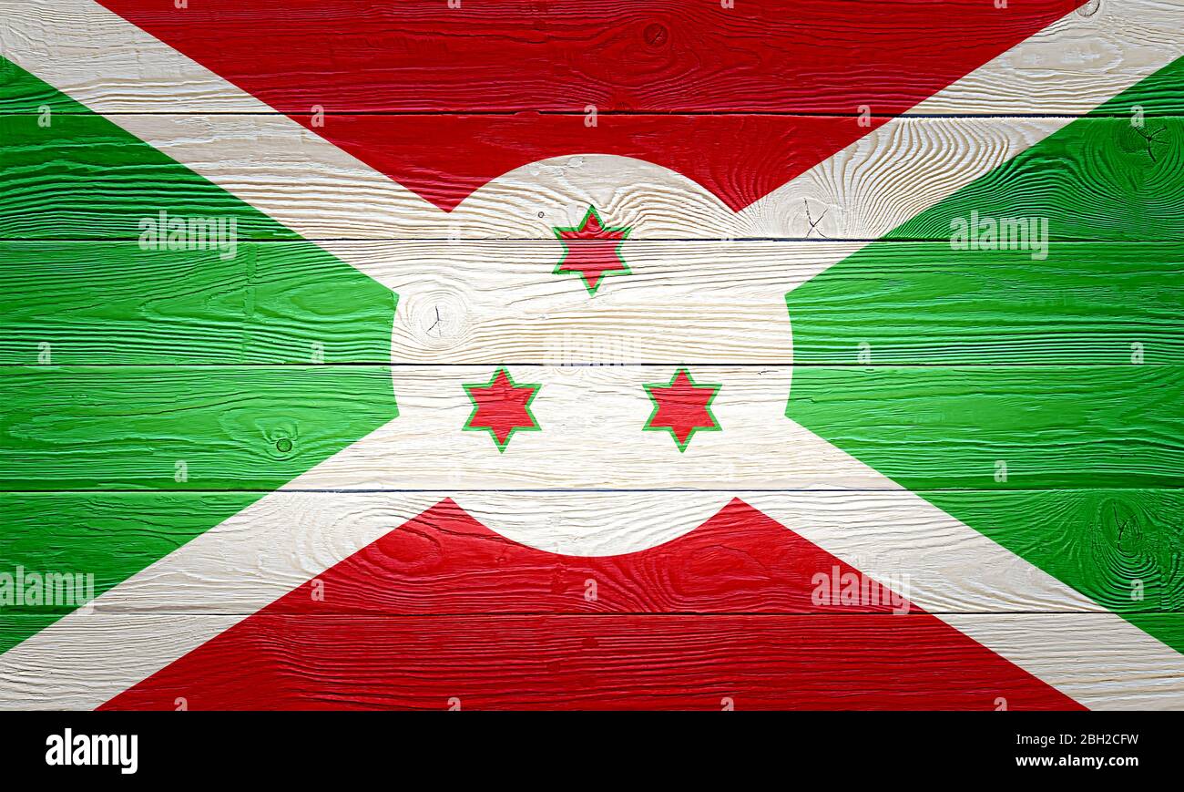 Burundi flag painted on old wood plank background. Brushed natural ...