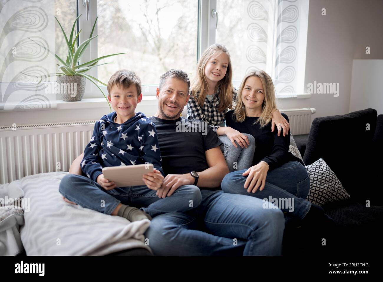 Father daughter relaxing on couch hi-res stock photography and images - Alamy