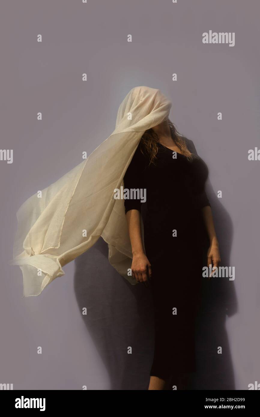 Face hidden cloth hi-res stock photography and images - Alamy