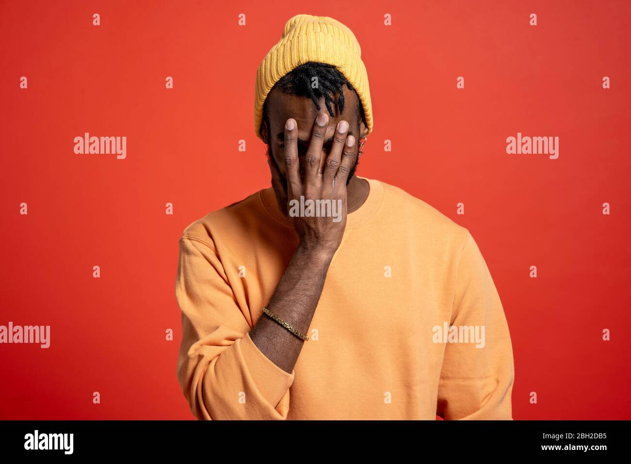 Man covering face dark hi-res stock photography and images - Alamy