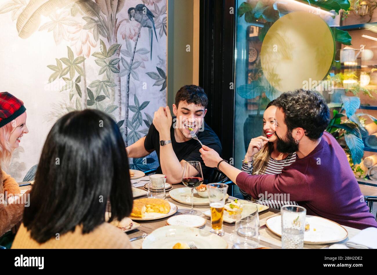 Friends having dinner in restaurant hi-res stock photography and images ...