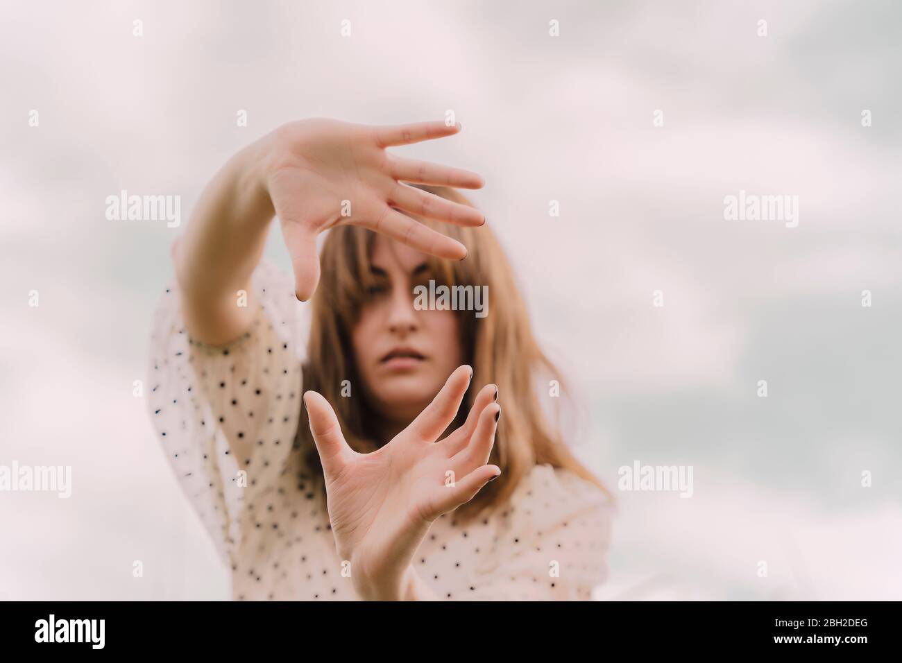 Portrait of woman in vintage dress reaching out Stock Photo - Alamy