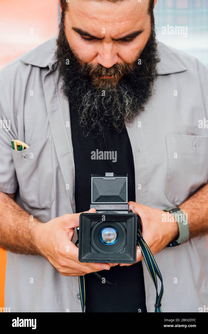 Bearded photographer taking photo hi-res stock photography and images ...