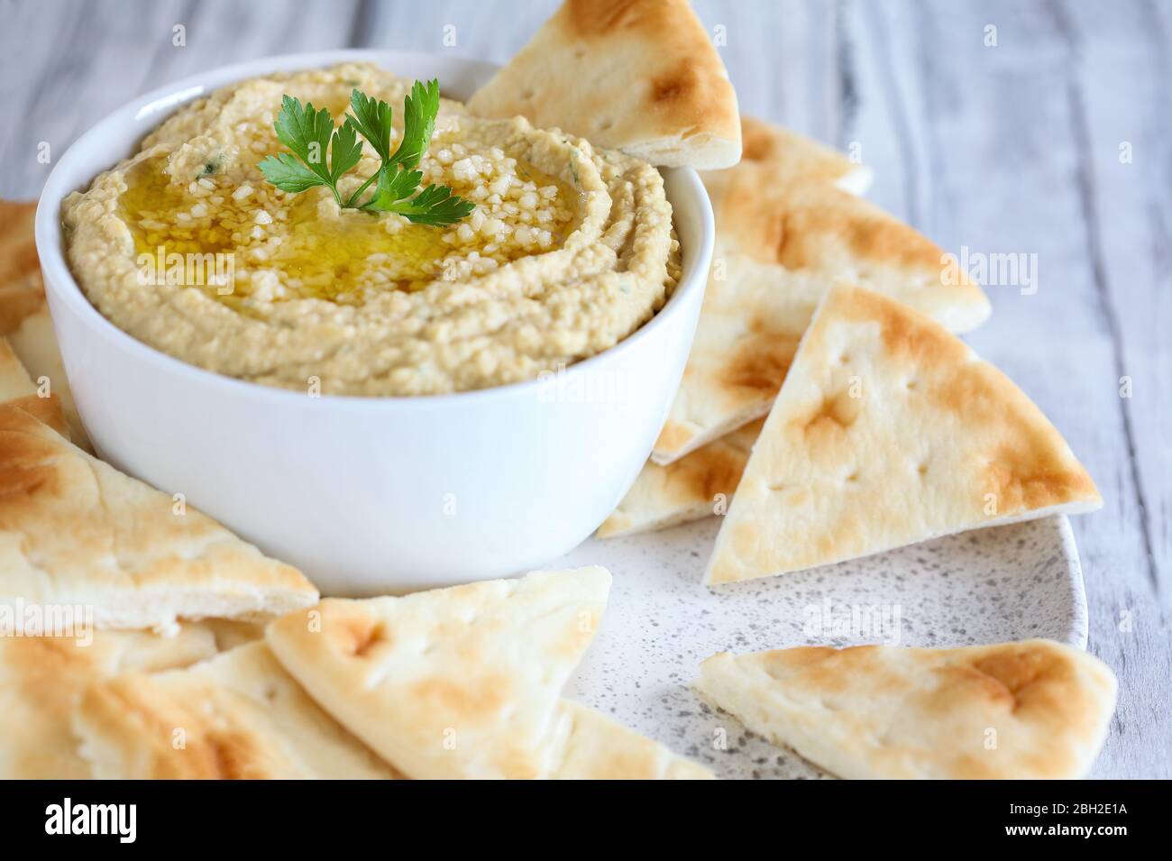 Vegan Hummus, made with chickpeas and tahini, with olive oil and garlic ...