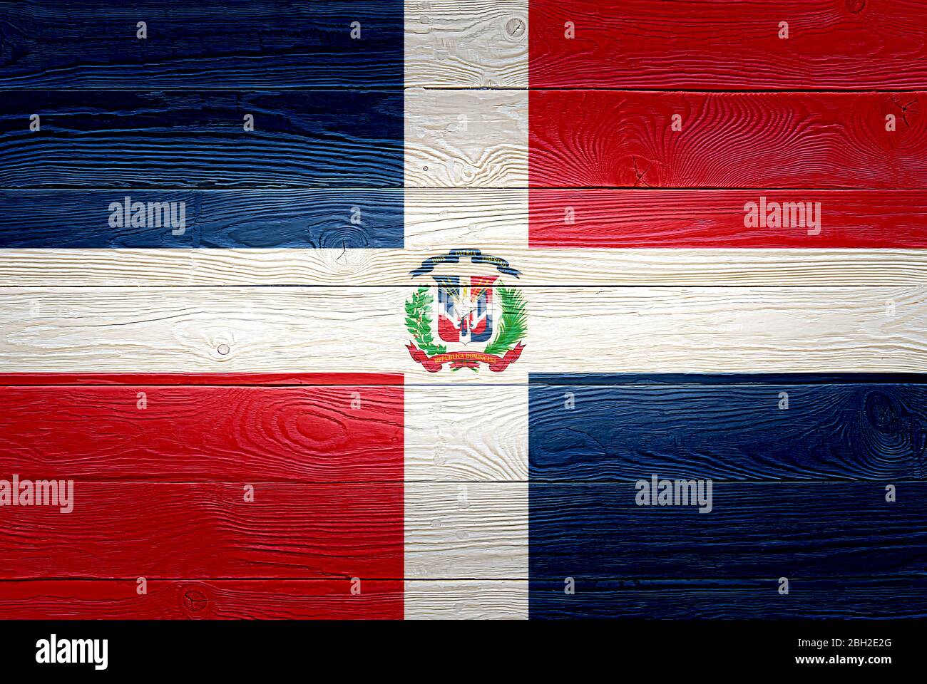 Dominican Republic flag painted on old wood plank background. Brushed ...