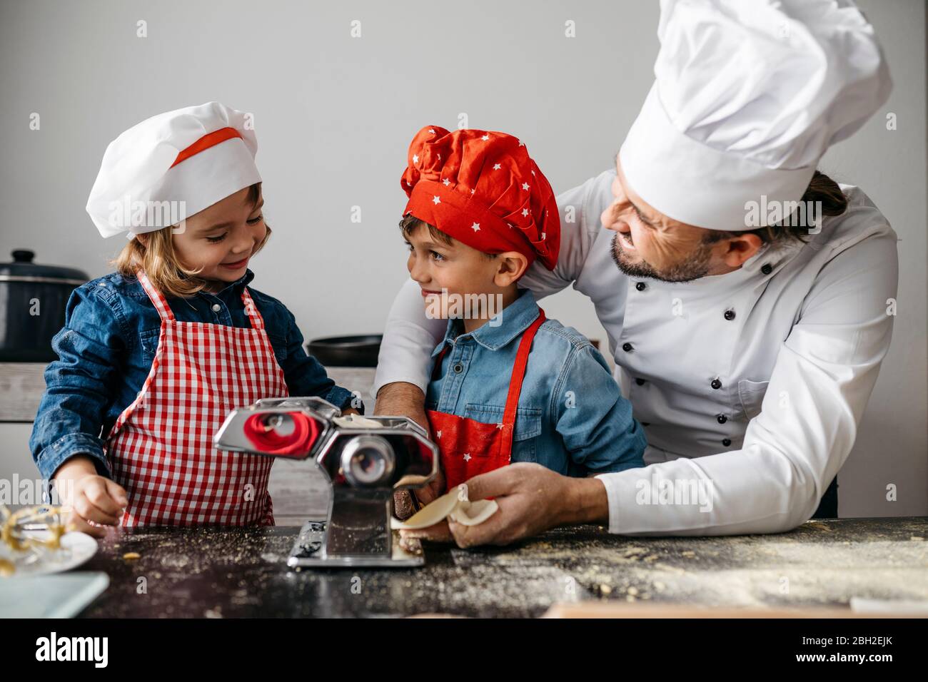 Kids making pasta hi-res stock photography and images - Alamy