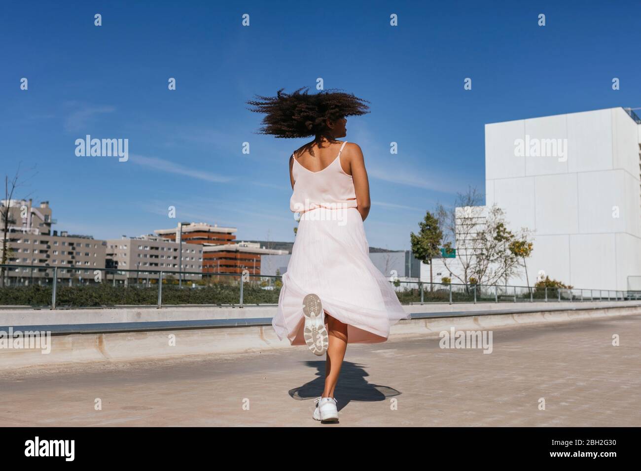 Back view young ballet dancer hi-res stock photography and images - Alamy