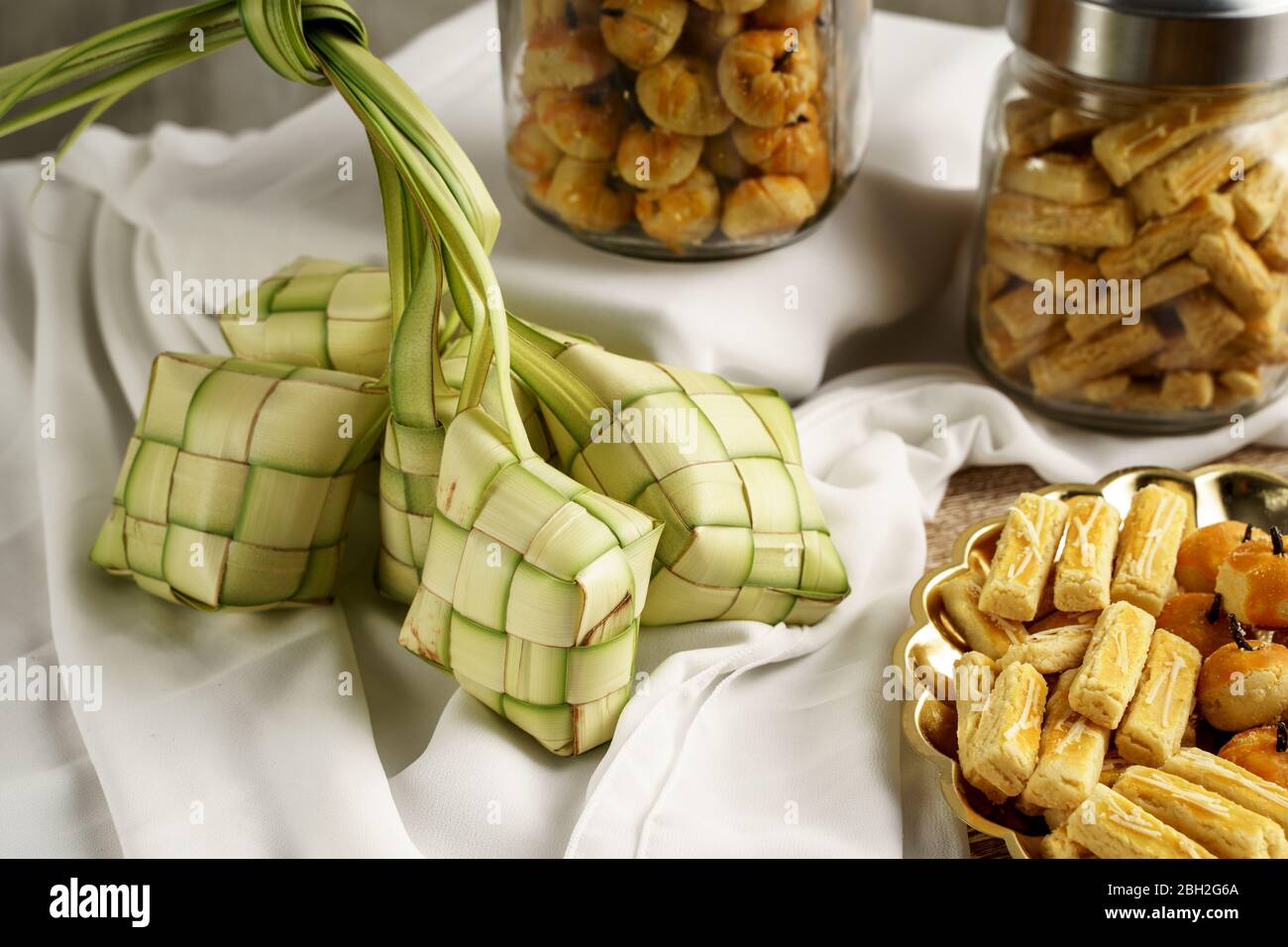 ketupat and snacks for eid mubarak. muslim celebration culinary Stock ...