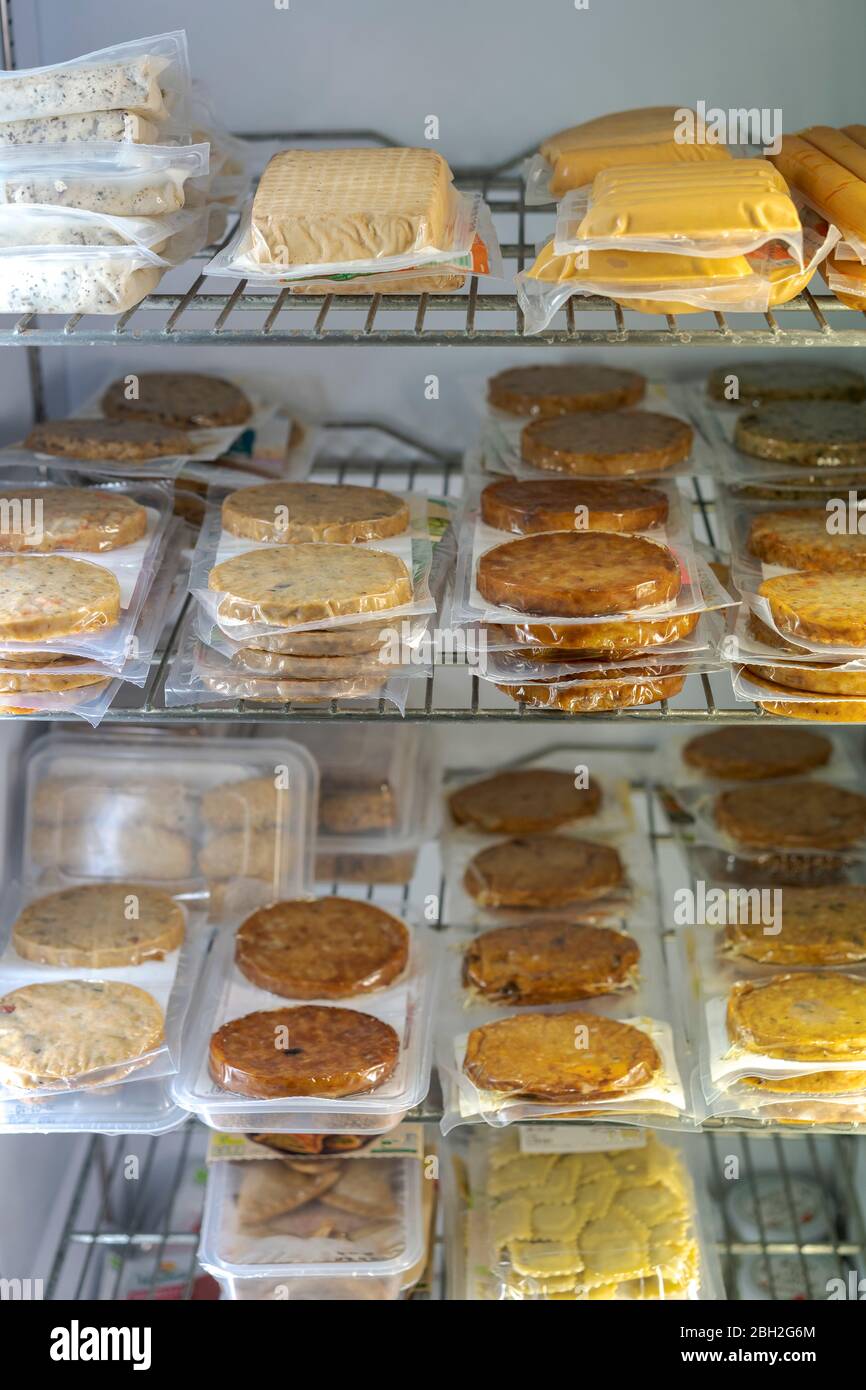 Sealed food in fridge in a small food store Stock Photo - Alamy