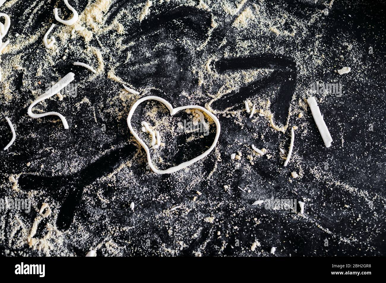 Homemade pasta ad arrow drawn in flour Stock Photo - Alamy