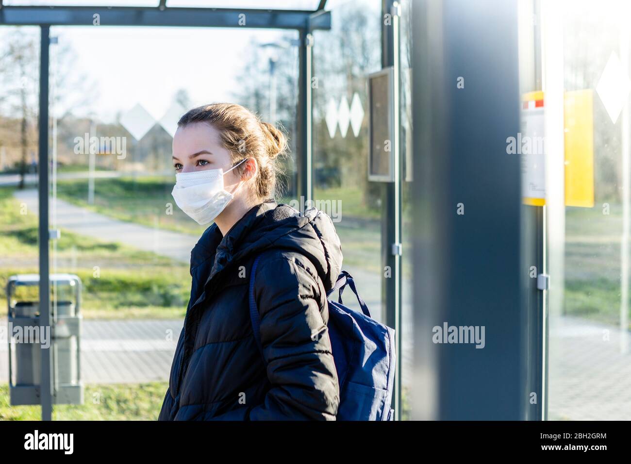 Girl alone at bus stop hi-res stock photography and images - Alamy