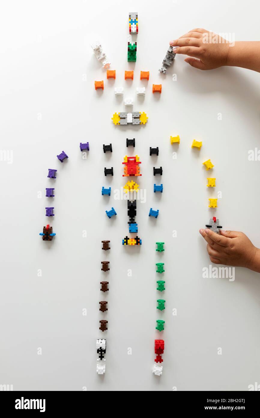 Children hands blocks hi-res stock photography and images - Alamy