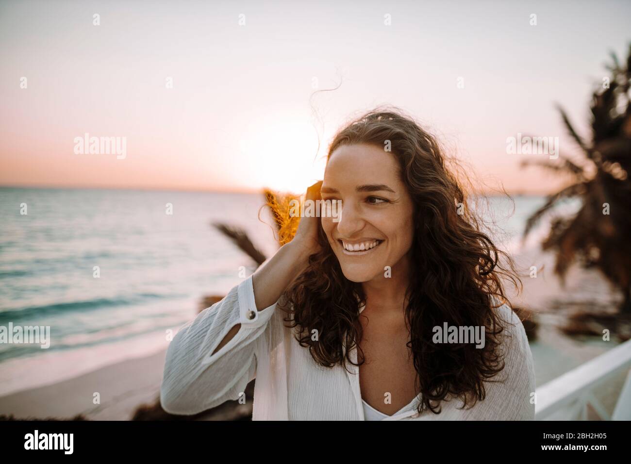 Woman enjoying morning sun hi-res stock photography and images - Alamy