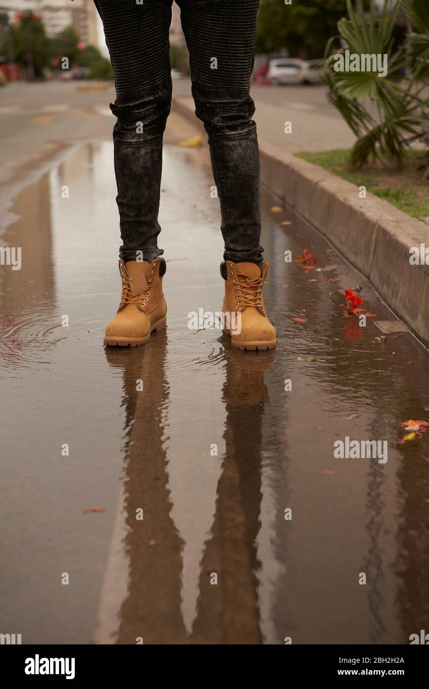 Man puddle water hi-res stock photography and images - Alamy