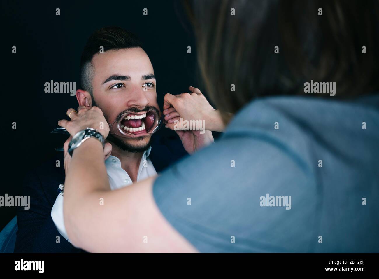 Receiving medical treatment hi-res stock photography and images - Alamy