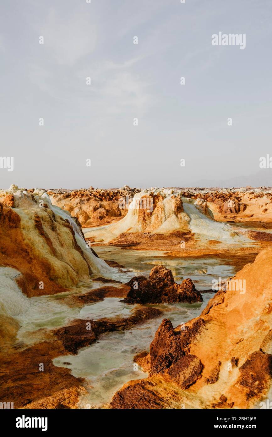 Volcanic landscape against sky at Dallol Geothermal Area in Danakil ...