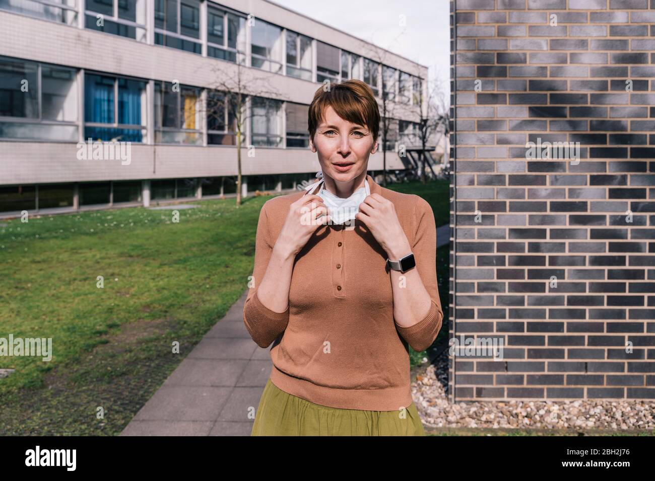 Taking off mask hi-res stock photography and images - Alamy