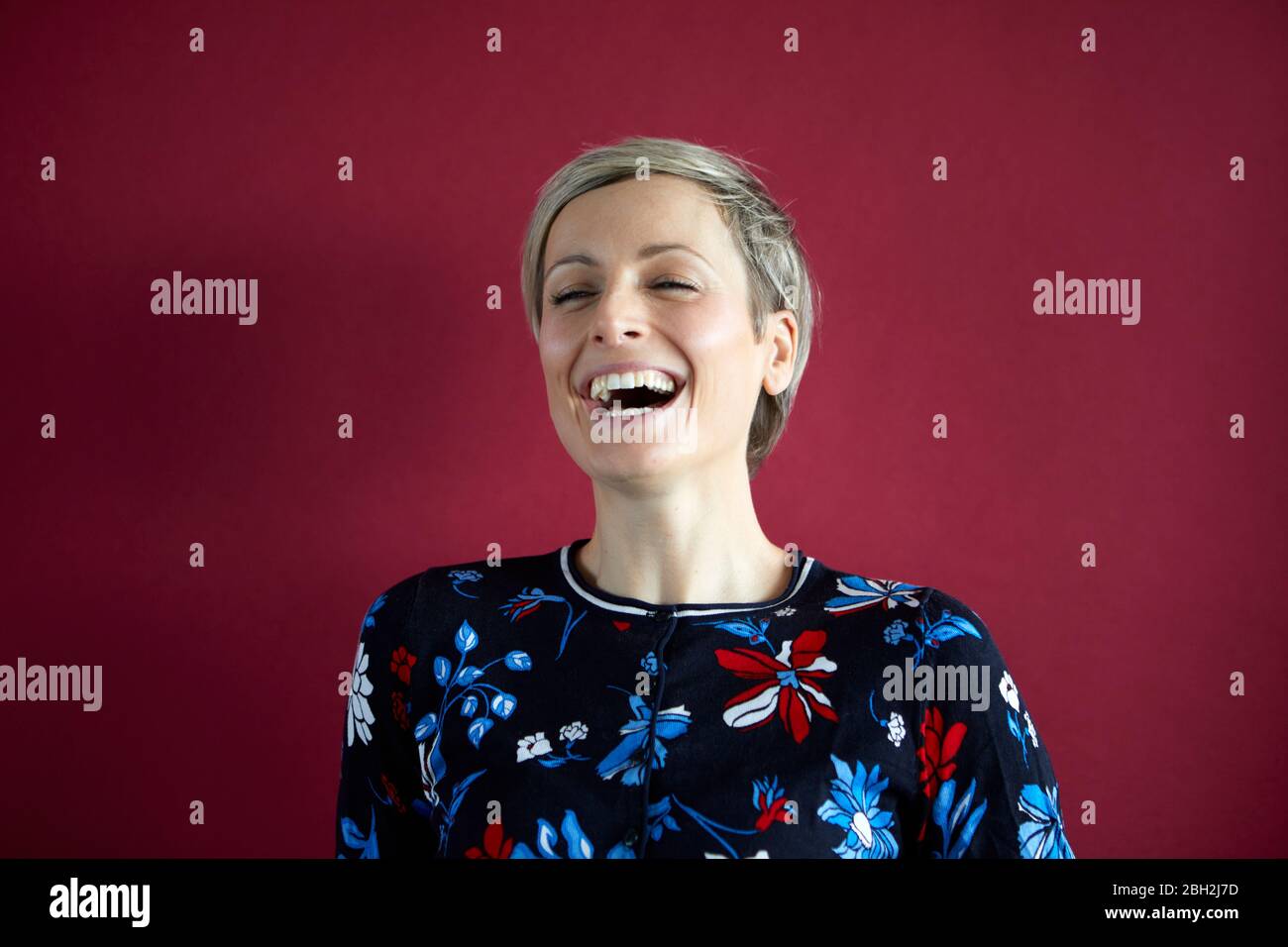 Happy laughing short hair blond hi-res stock photography and images - Alamy