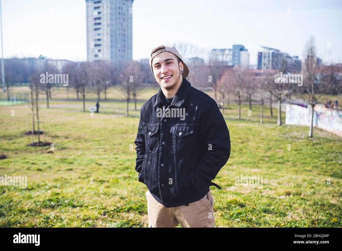 Man standing in park hi-res stock photography and images - Alamy