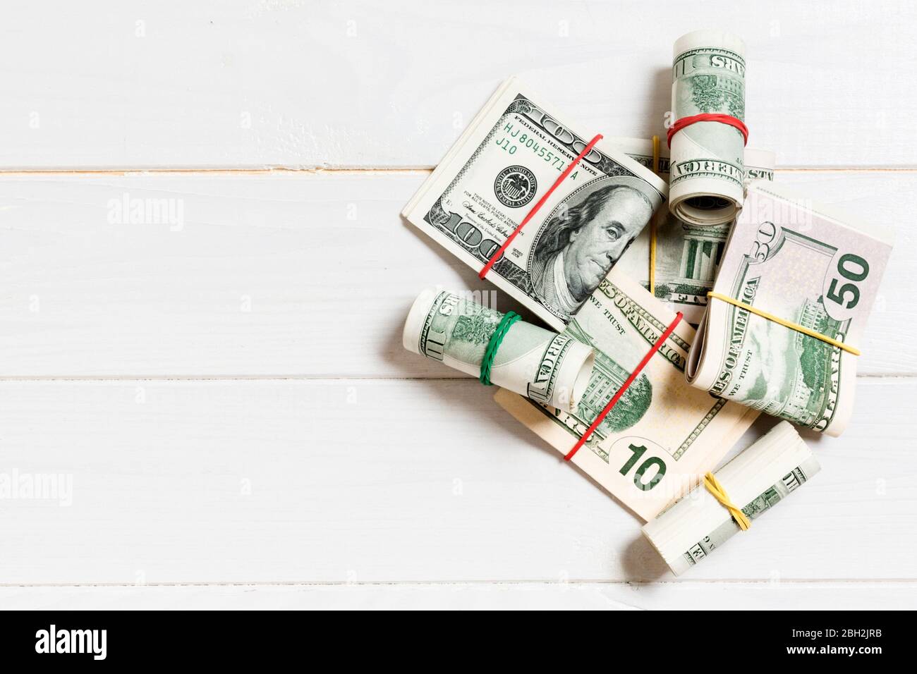 US Dollar bills bundles stack. one hundred dollar bills with stack of ...