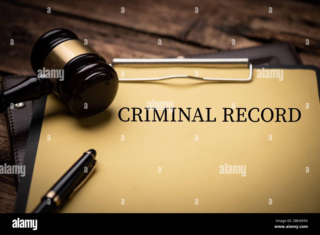 Criminal Record text on Document and gavel isolated on wooden office ...