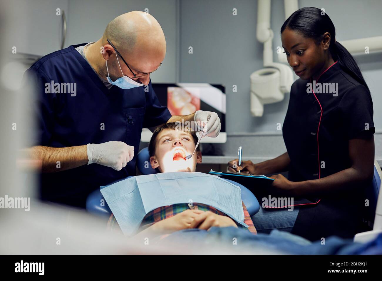 Children receiving medicine hi-res stock photography and images - Alamy