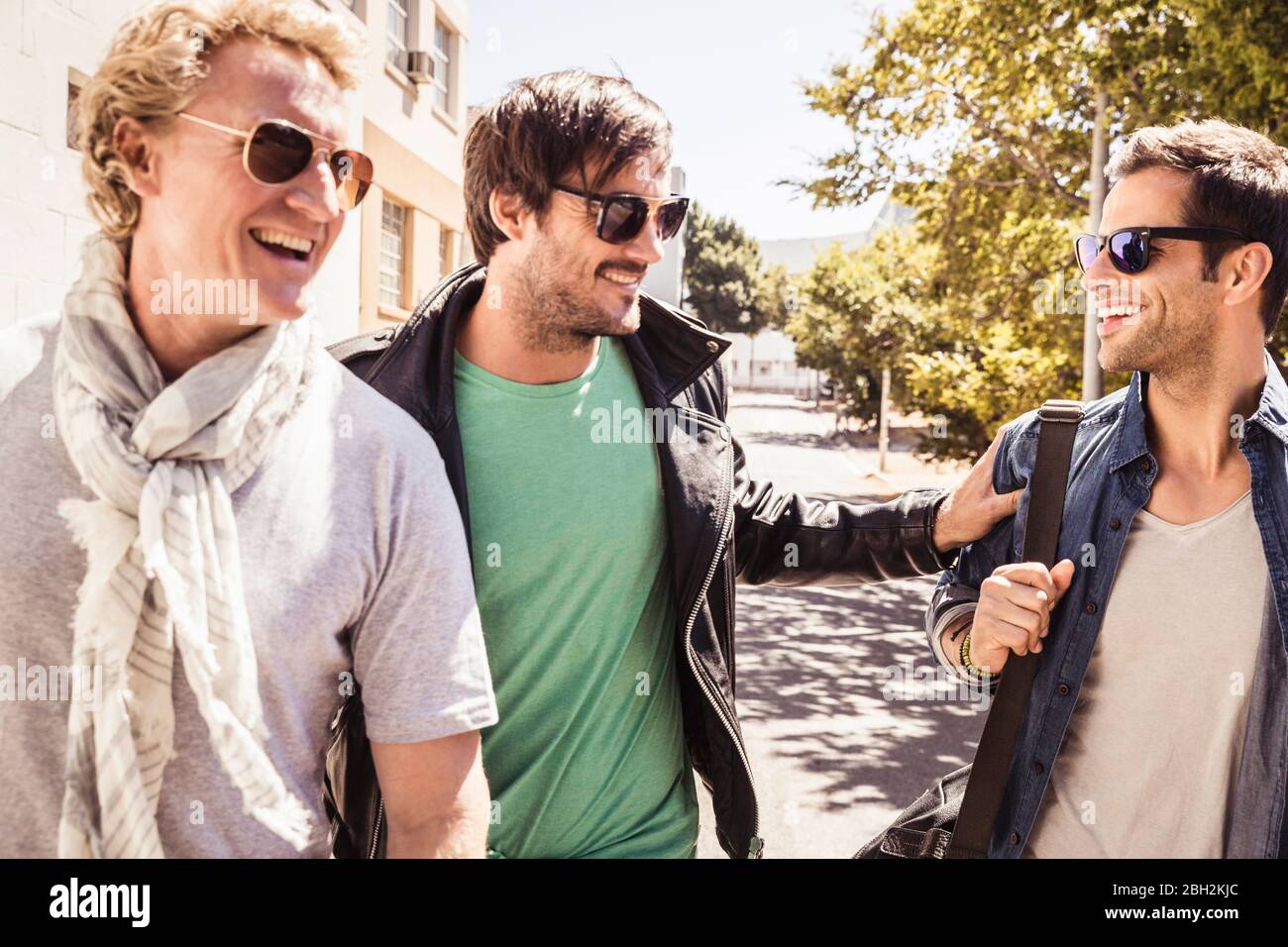 Three men friends hi-res stock photography and images - Alamy
