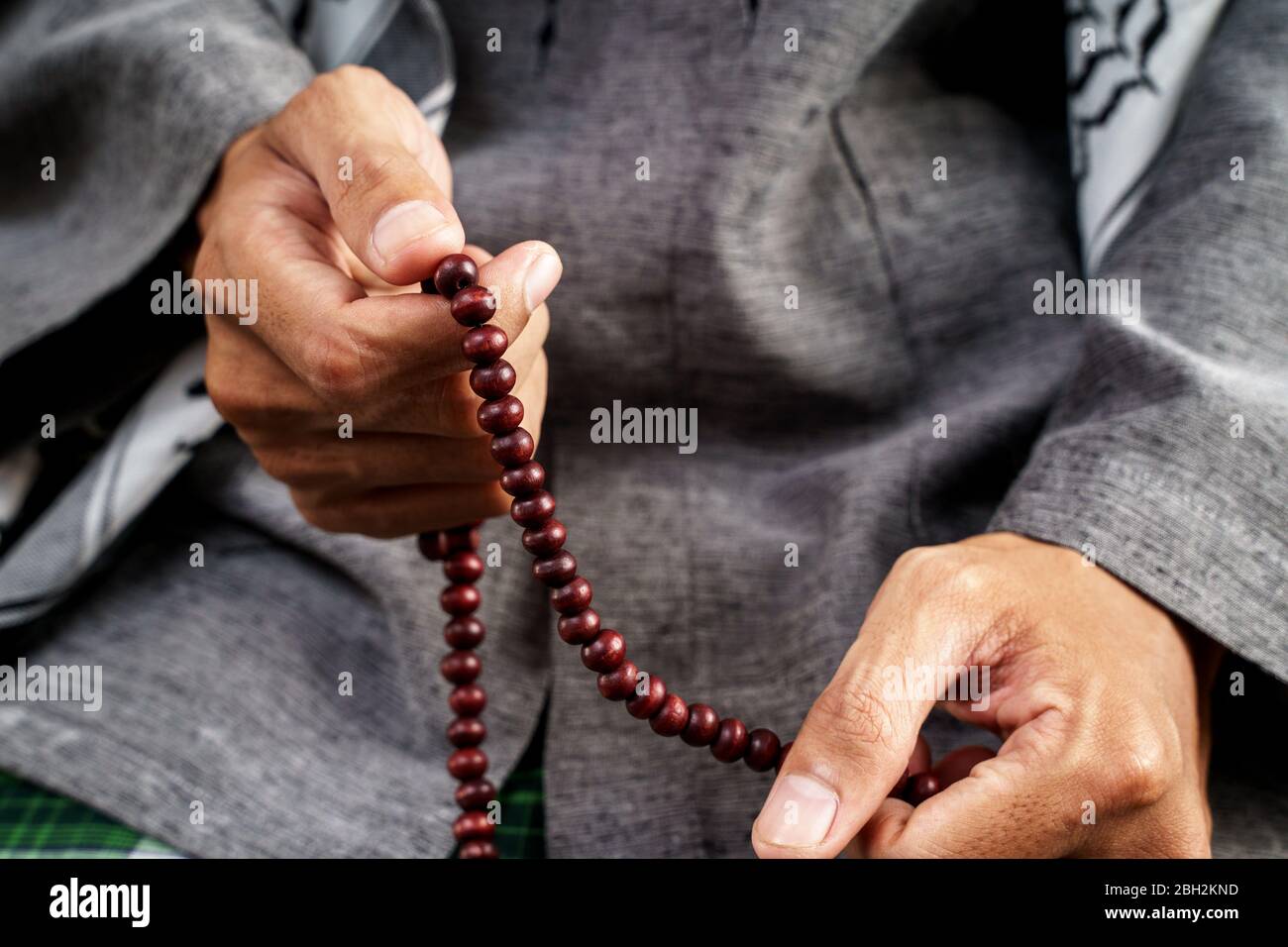gesture of hand pray in islamic culture couting on prayer beads Stock ...