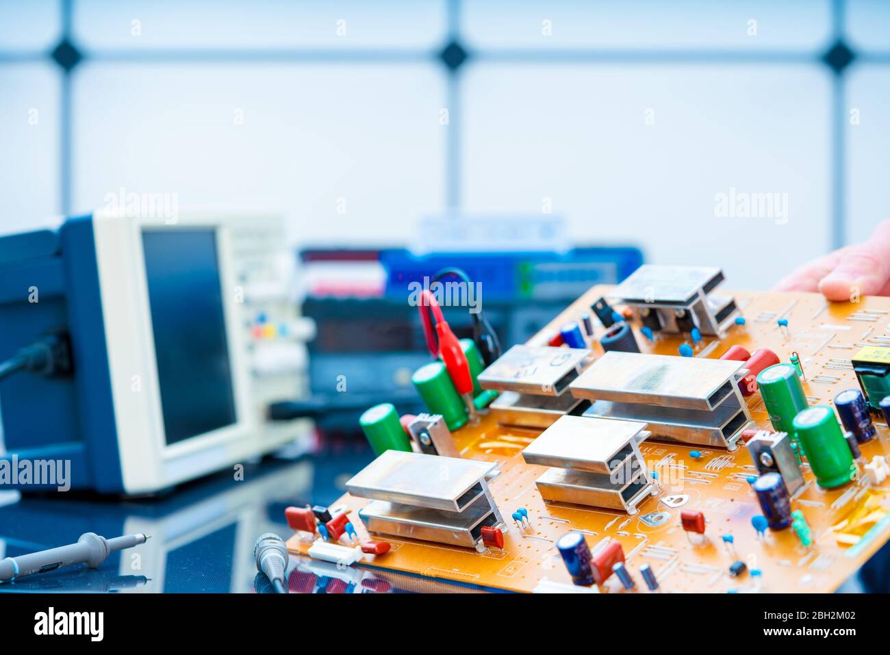 Debugging electronics device. PCB witch microcontroller in electronics ...