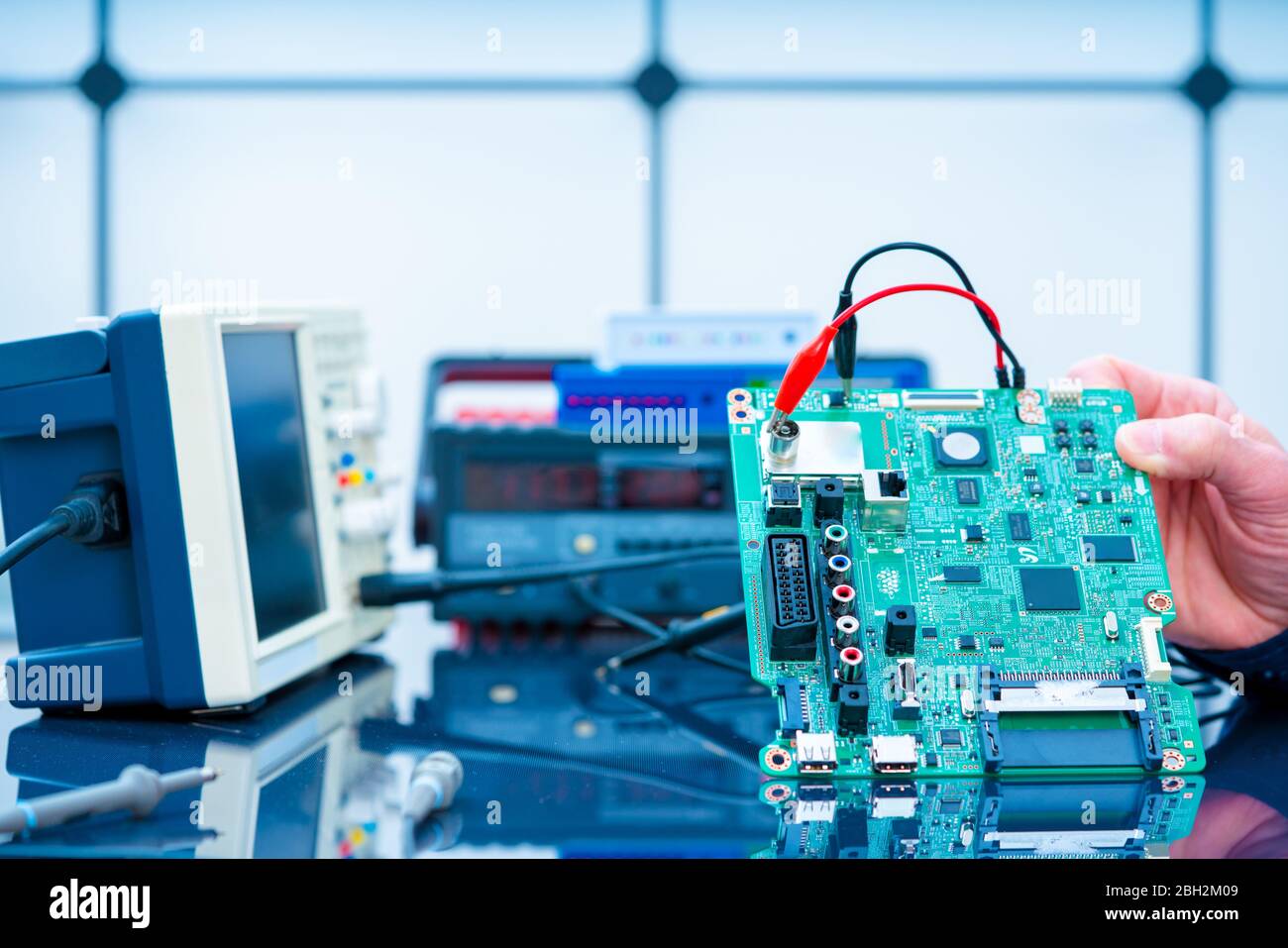 Debugging electronics device. PCB witch microcontroller in electronics laboratory Stock Photo ...