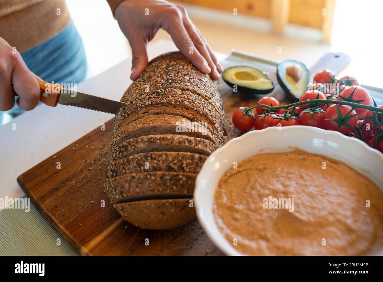 Man cutting bread knife preparing hi-res stock photography and images ...