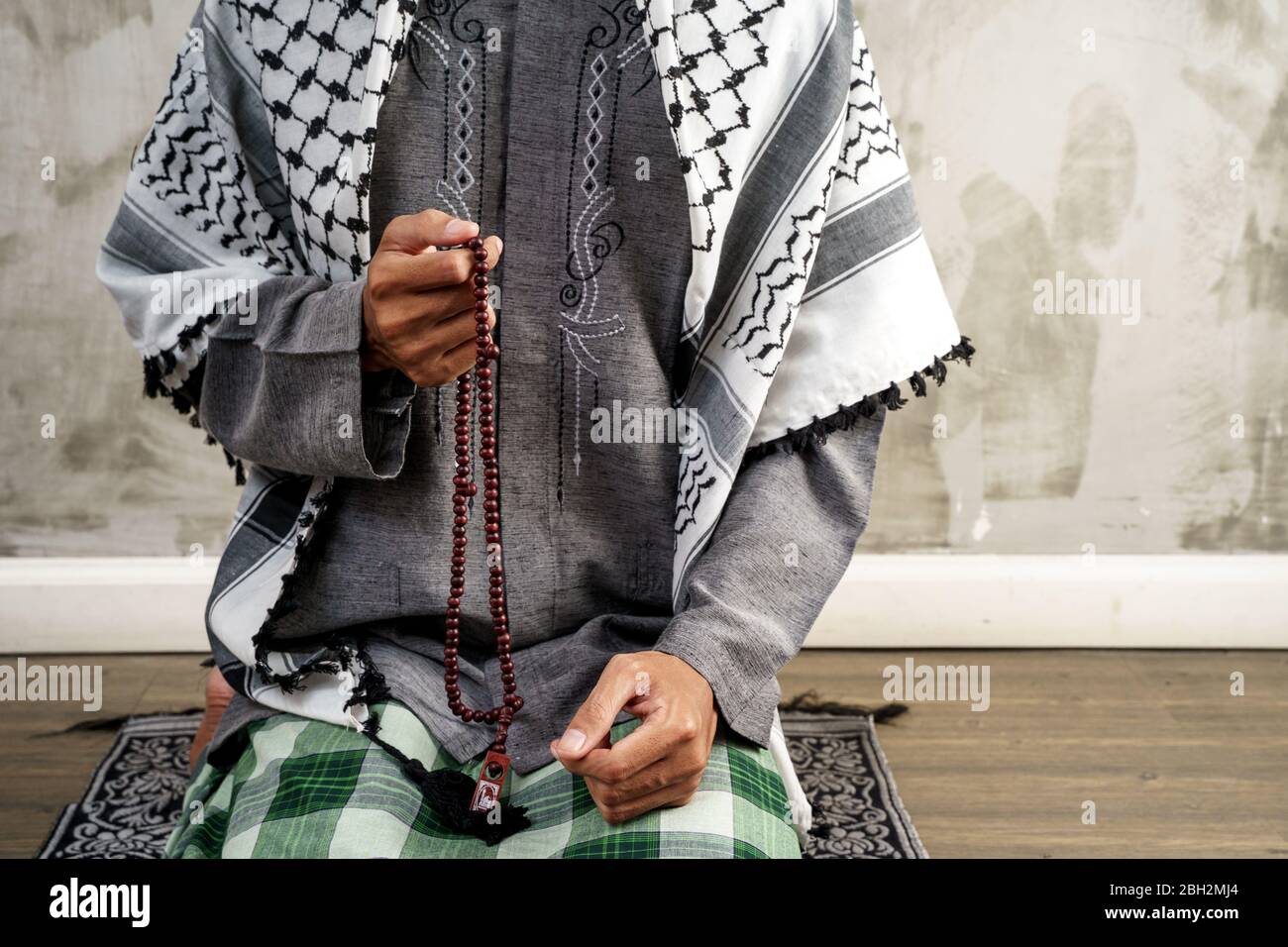 gesture of hand pray in islamic culture couting on prayer beads Stock ...