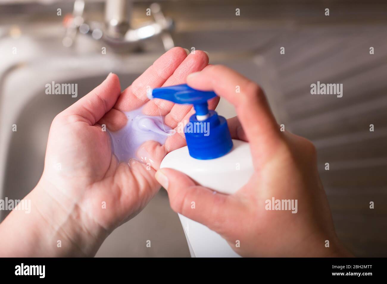 Hand sanitiser and pumping hi-res stock photography and images - Alamy