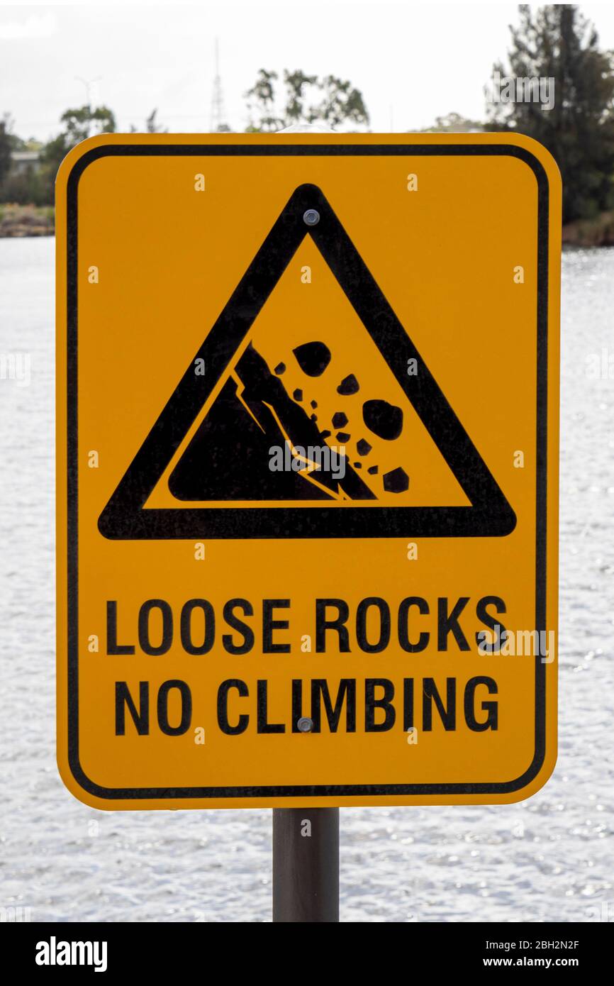 Loose rocks no climbing sign Stock Photo - Alamy