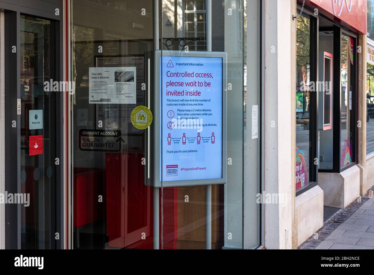 Signs in Shop windows advising customers about Coronavirus Cover-19 ...