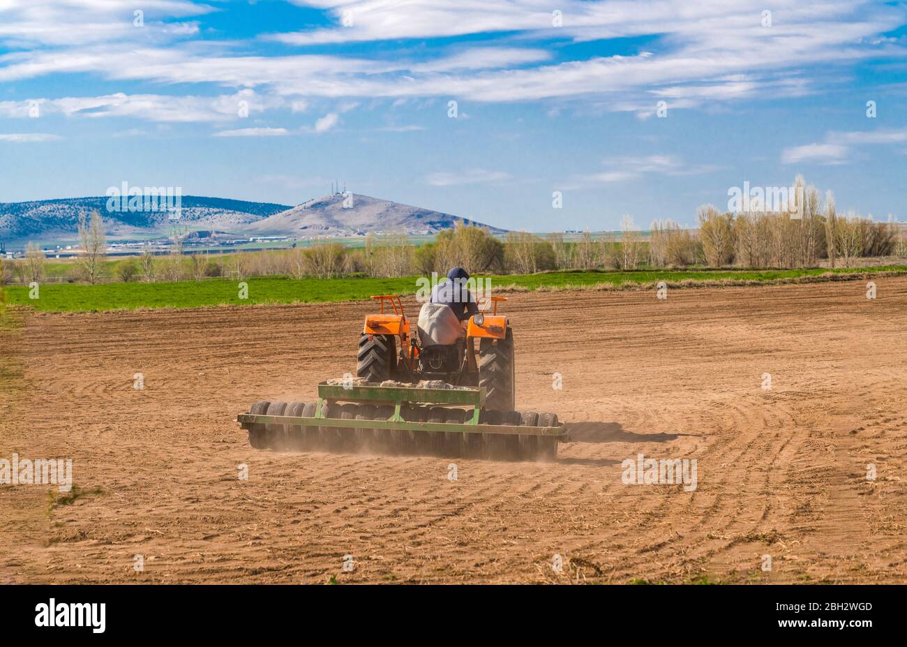 Back view farm tractor plough hi-res stock photography and images - Alamy