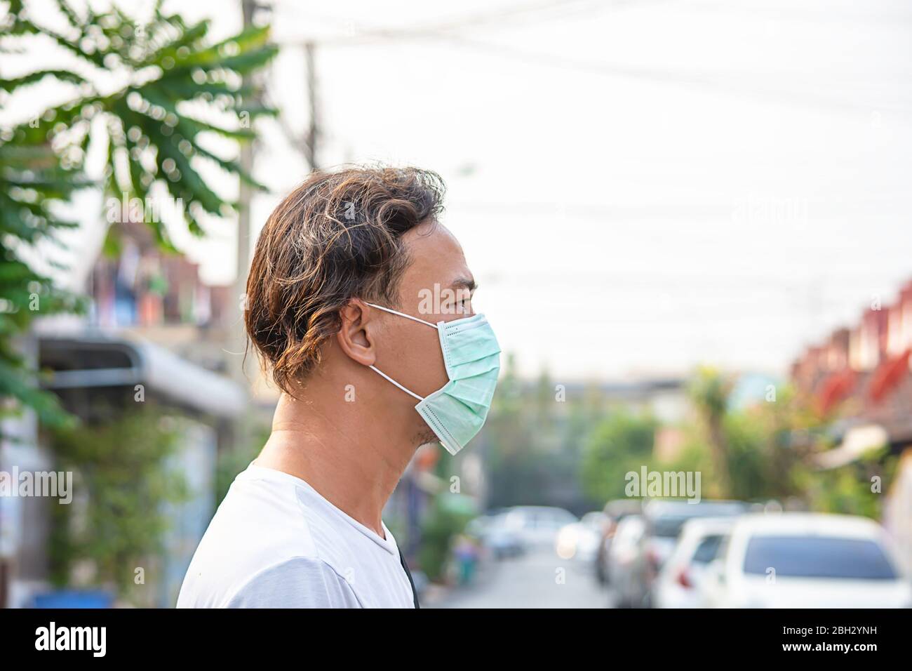 Asean man wear a mask to prevent dust in Bangkok ,Thailand Stock Photo ...