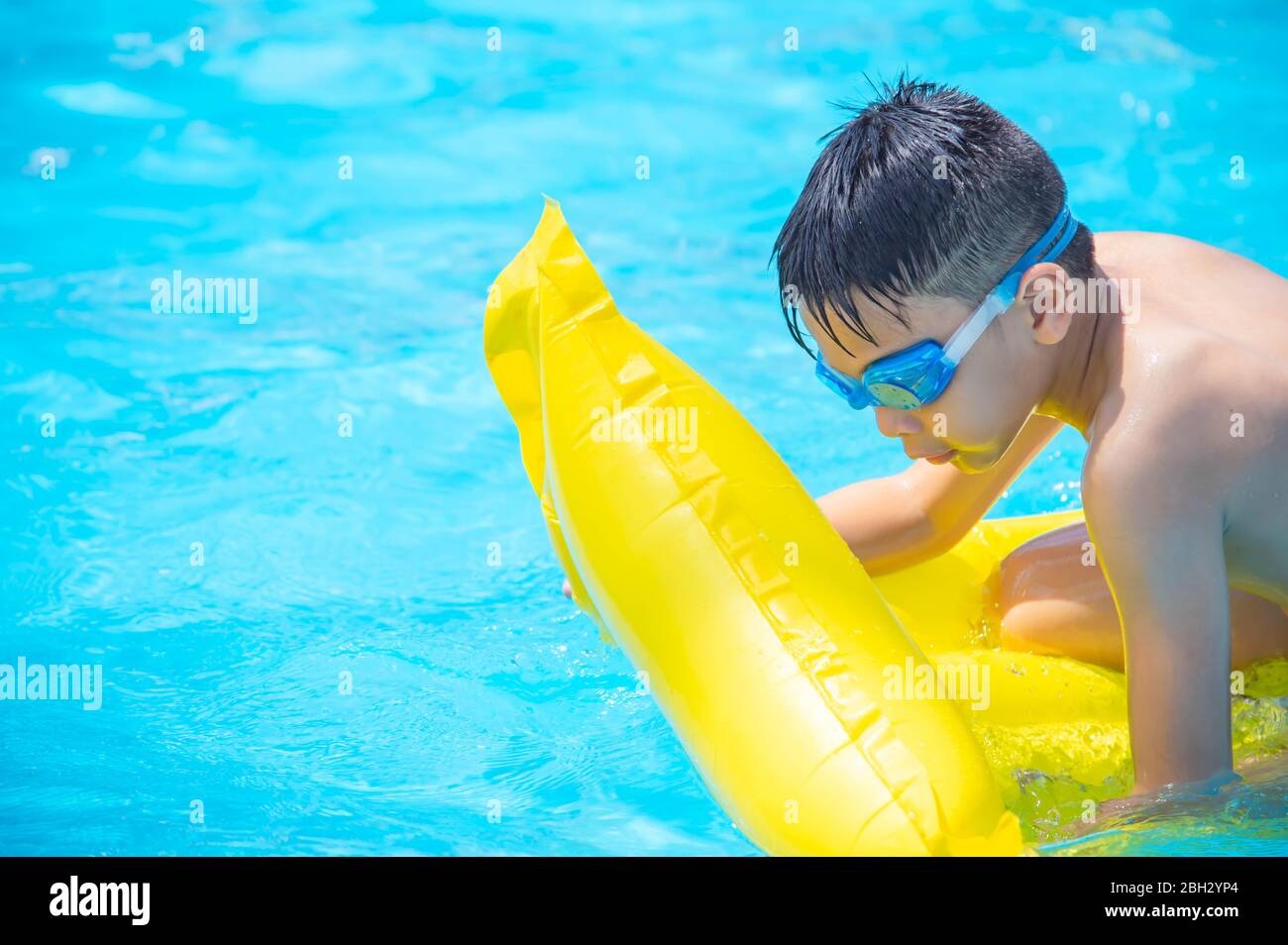 Child wearing swimsuit hi-res stock photography and images - Alamy