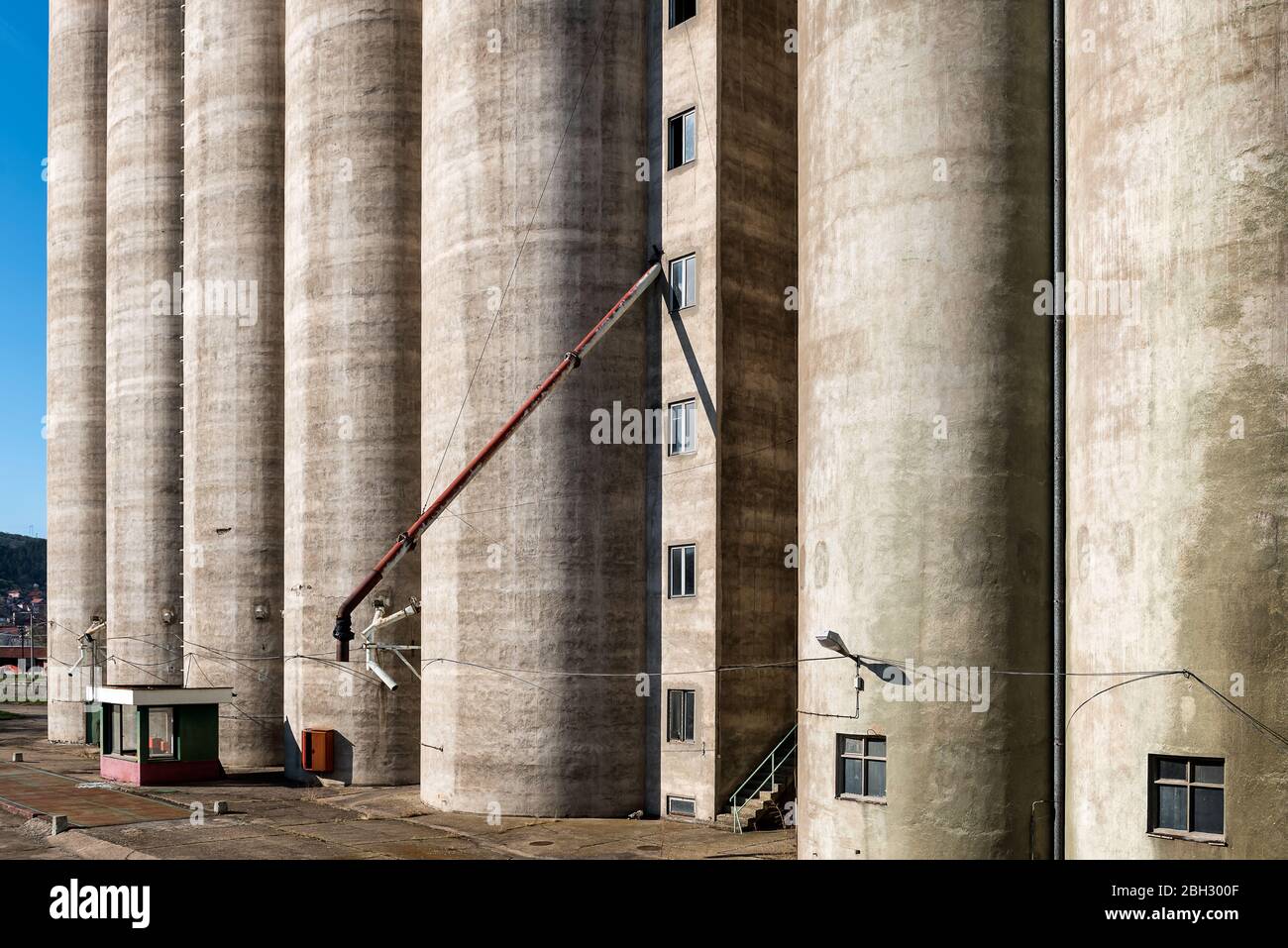 Old Vintage Abandoned Grain Silo with checkpoint. Grain terminal ...