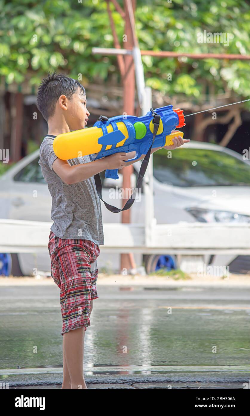 Boy water gun hi-res stock photography and images - Alamy