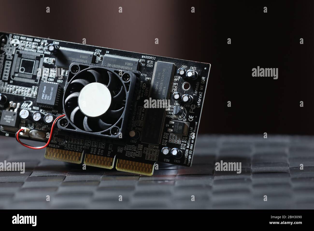 old video card isolated on dark background Stock Photo - Alamy