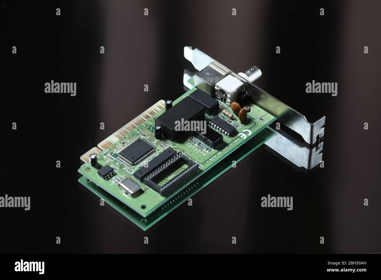 green computer chip isolated on a black background Stock Photo - Alamy