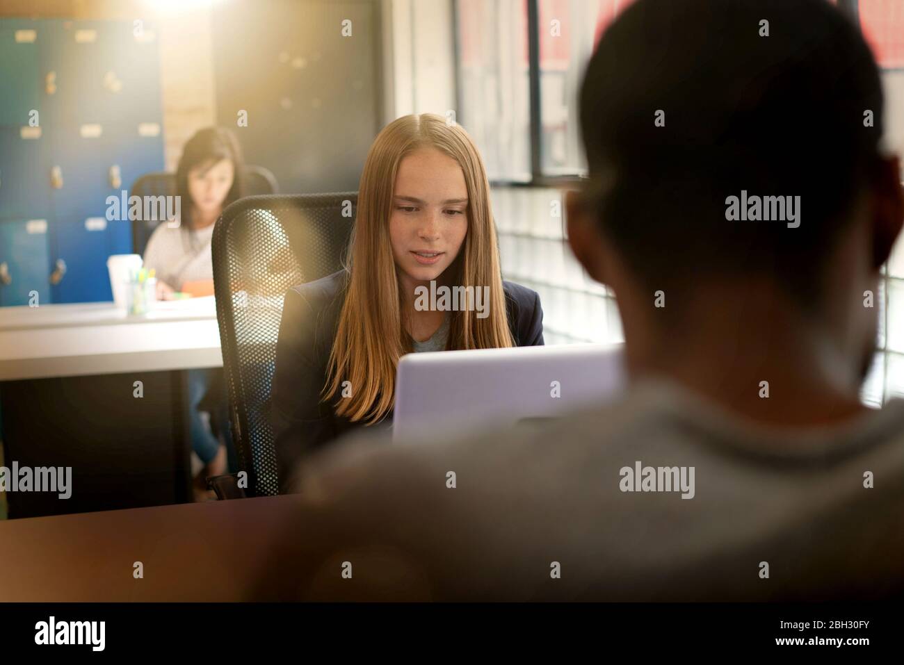 Co workers busy working in modern office space Stock Photo - Alamy