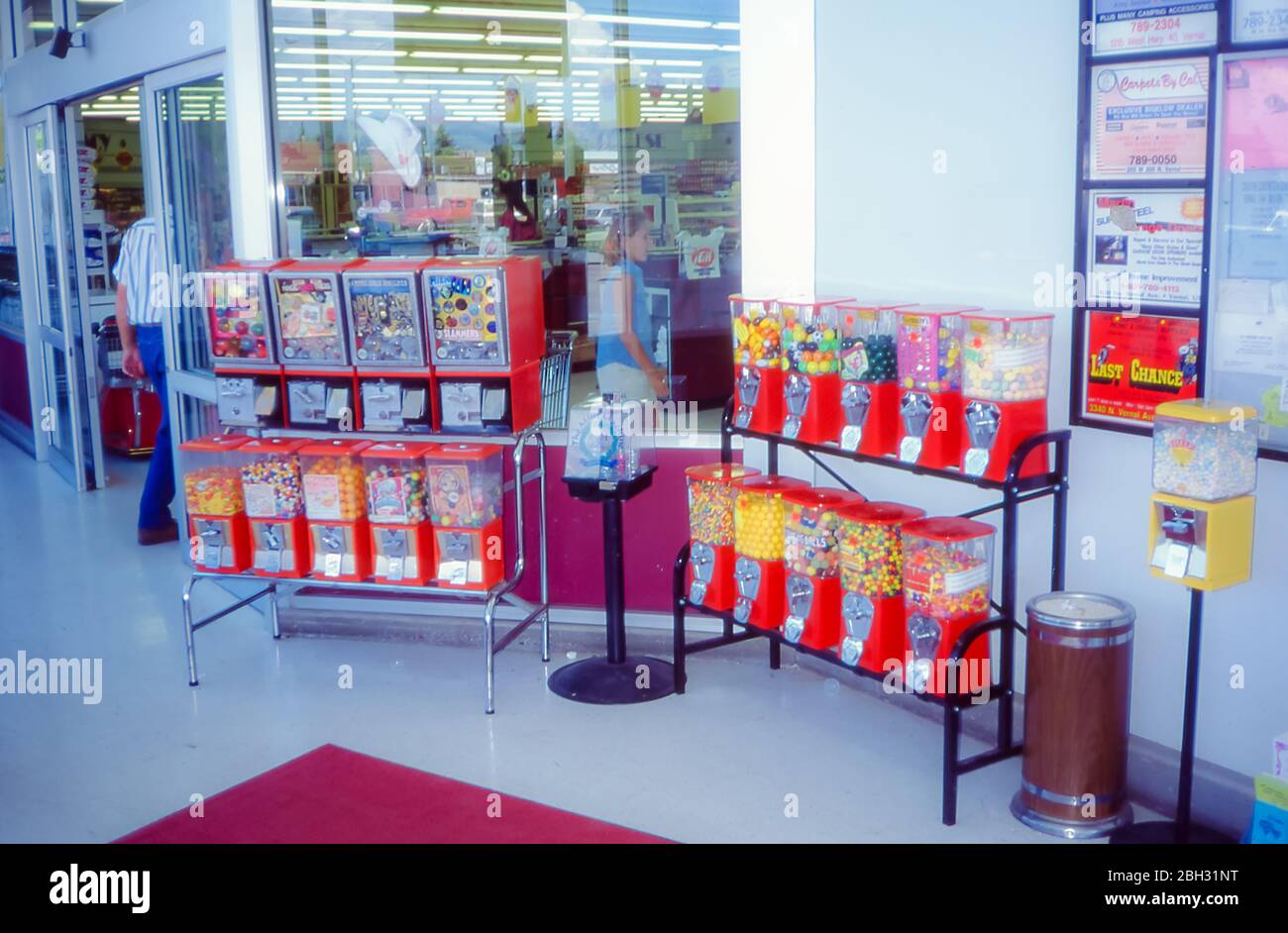 Dozens of vending machines for sweets in front of an American ...