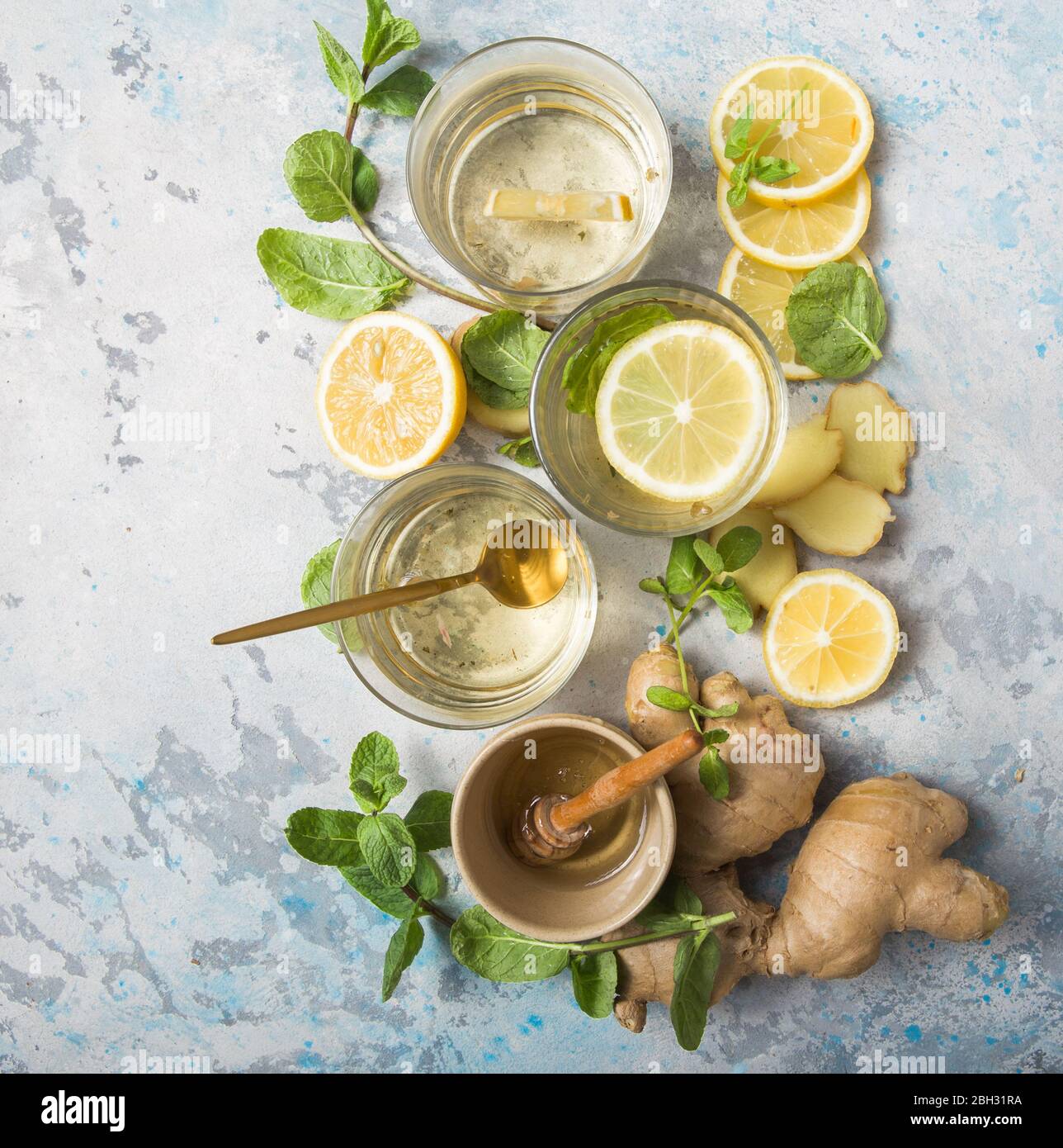 Lemon and ginger tea with honey. Healthy ingredients against cold. Top ...