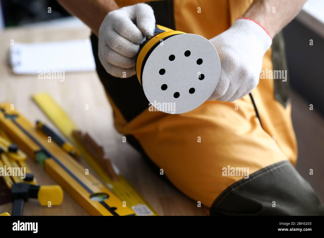 Handyman holding screwdriver working hi-res stock photography and ...