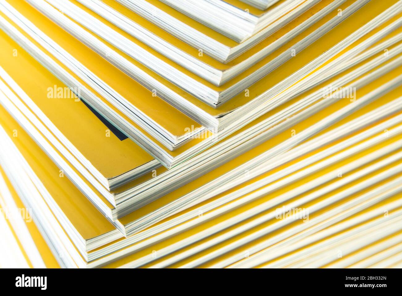 Book stack yellow hi-res stock photography and images - Alamy
